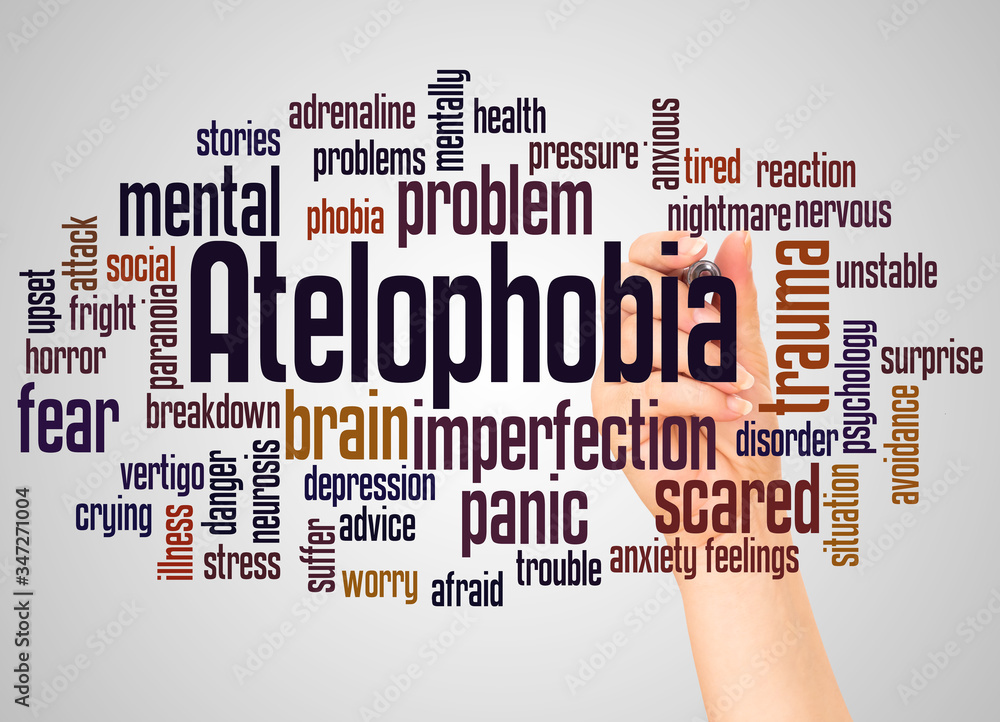 Atelophobia fear of imperfection word cloud and hand with marker ...