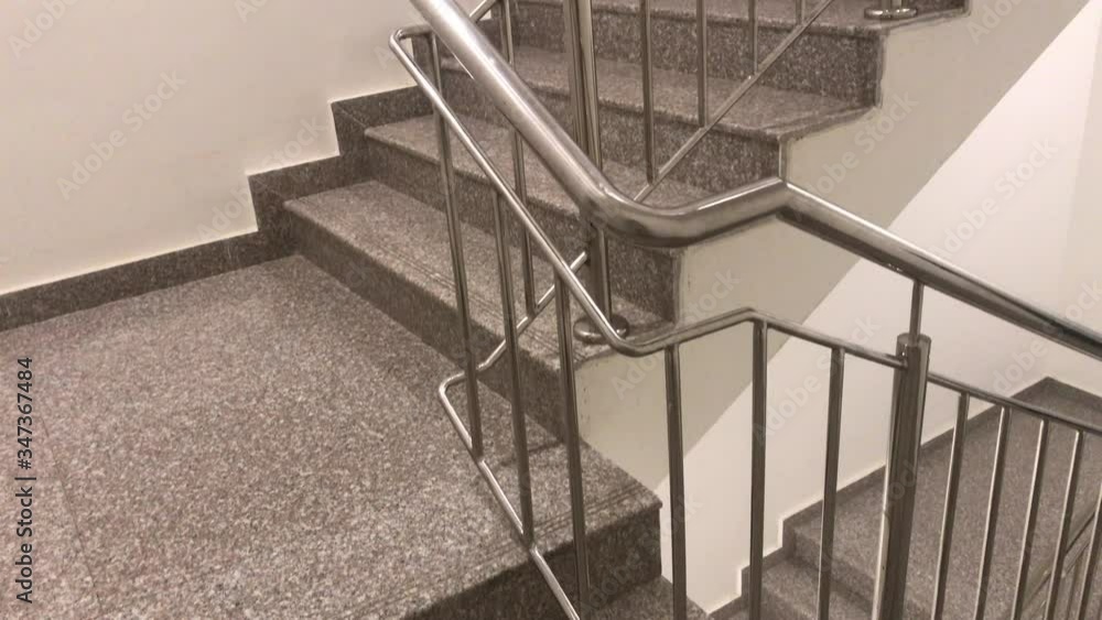 An Chrome plated Stainless steel hand rail for an fire staircase which ...