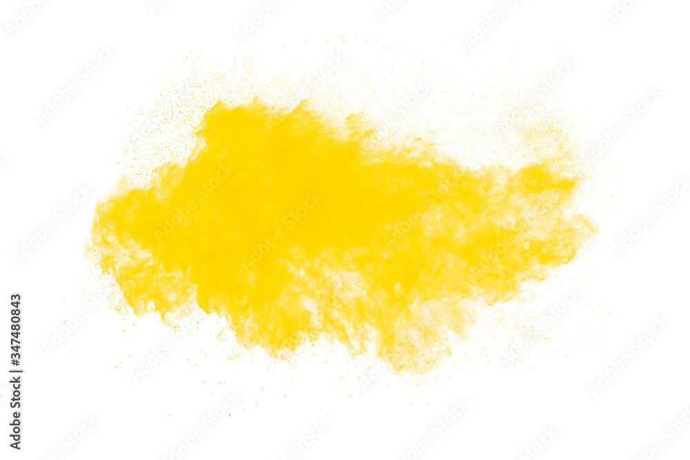 Yellow dust particles explosion on white background.Yellow powder dust ...