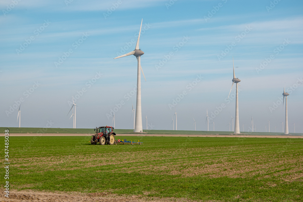 Windmill farm in the Netherlands, windmill turbine flowers and farmers ...