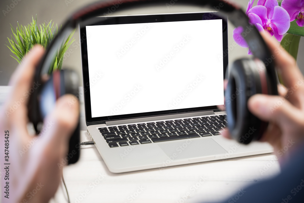 Home relax concept, a man listens to music at home. Laptop computer ...