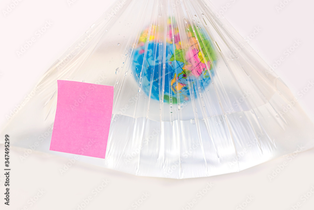 World environment day or World oceans day concept. Plastic bag with ...