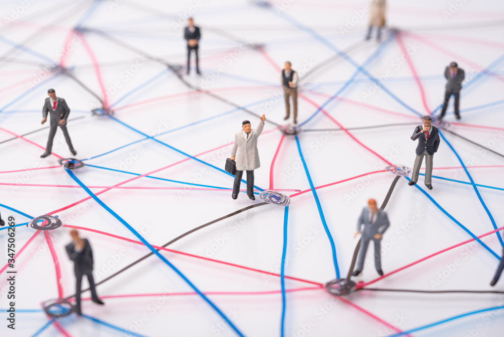 Foto de miniature people on connection line and dot , red black and ...