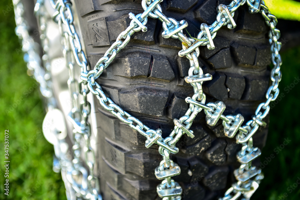 Tire chain for extra traction in mud and snow conditions on an off road ...