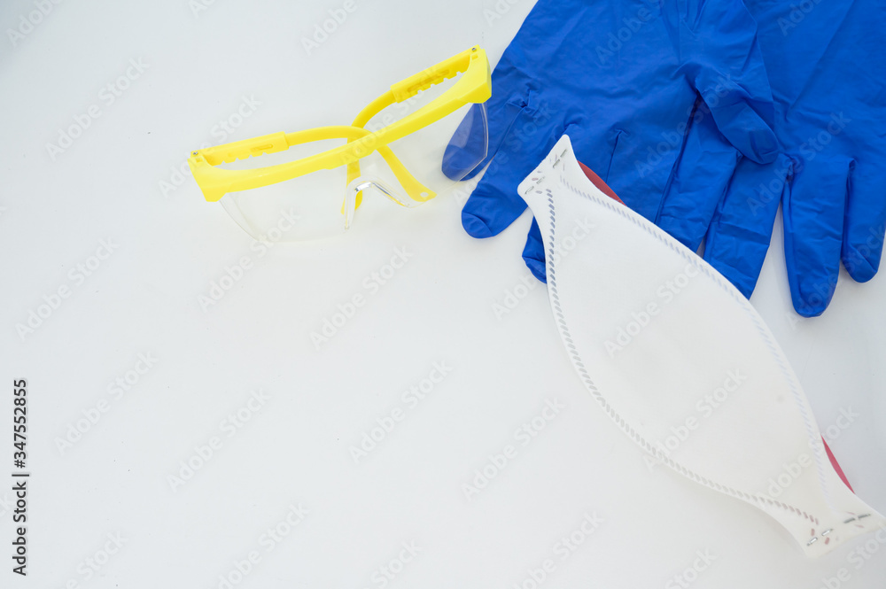 Gloves, face mask, glasses and sugical cap .Different medical ...