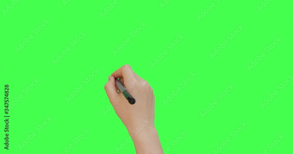Female right hand holding pen and writing check mark symbol. Green ...