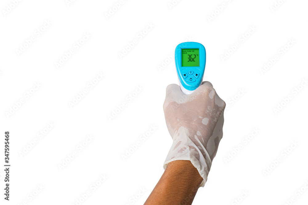 Hand holding Infrared thermometer for measuring body temperature on ...