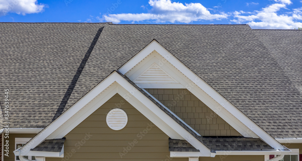 Aerial view of a double gable roof with triangle gable decoration and ...