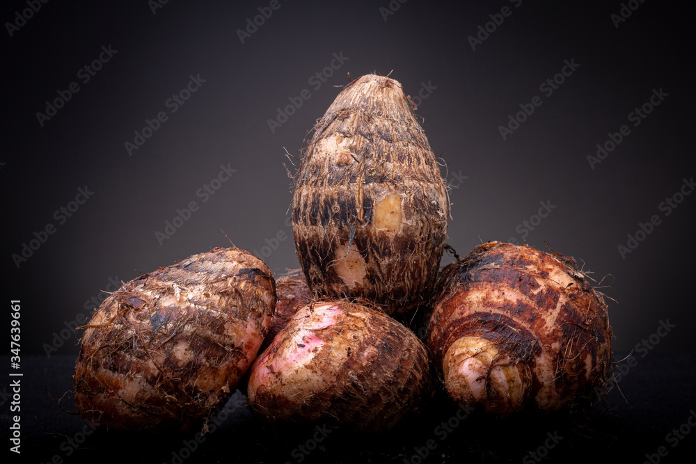 Texture of a hairy brown pink raw Yam edible vegetable from the local ...