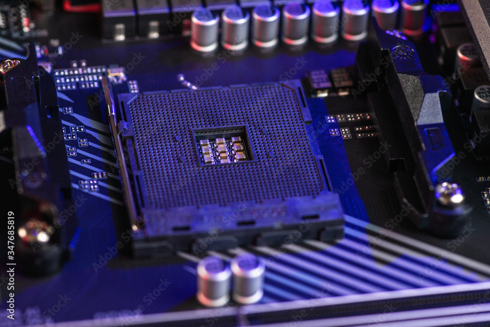 Close up of the AM4 socket for the motherboard with neon blue color ...