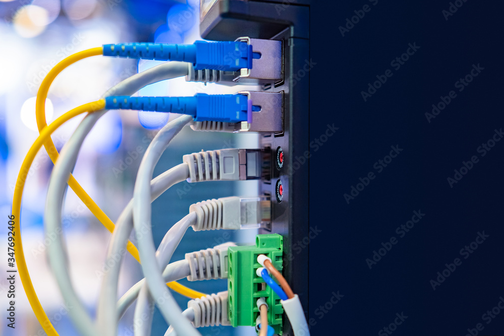 Colored wires are connected to the power supply. Network equipment ...