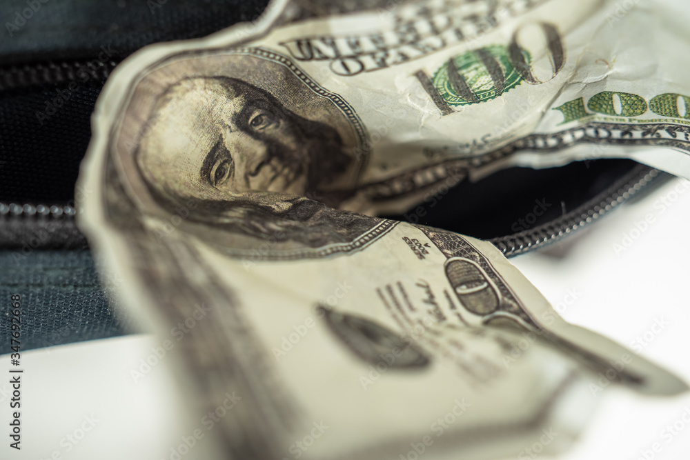Crumpled hundred-dollar bill close-up. Heavily crumpled banknote ...