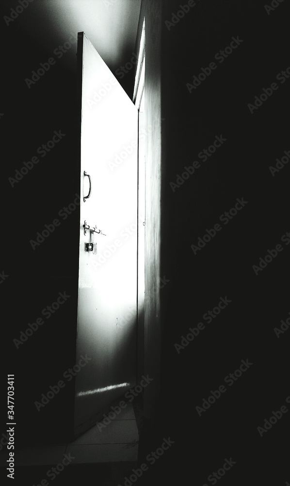 Partly Open Door Of Home Stock Photo | Adobe Stock