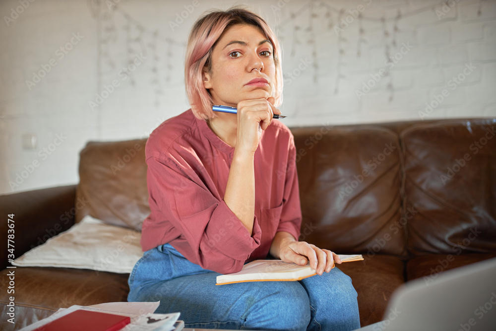 Stylish young female doing freelance job. Skillful woman copywriter ...