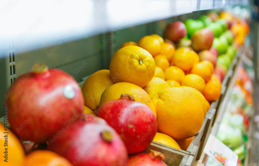 Ripe oranges on shelf in food shop.Buy fresh orange fruits in ...