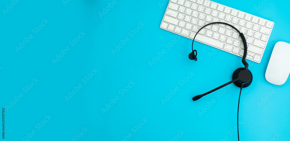 VOIP Helpdesk headset, keyboard computer notebook and mouse isolated on ...