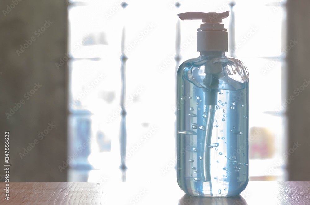 Washing hands with alcohol gel. Sanitizer after using a public restroom ...