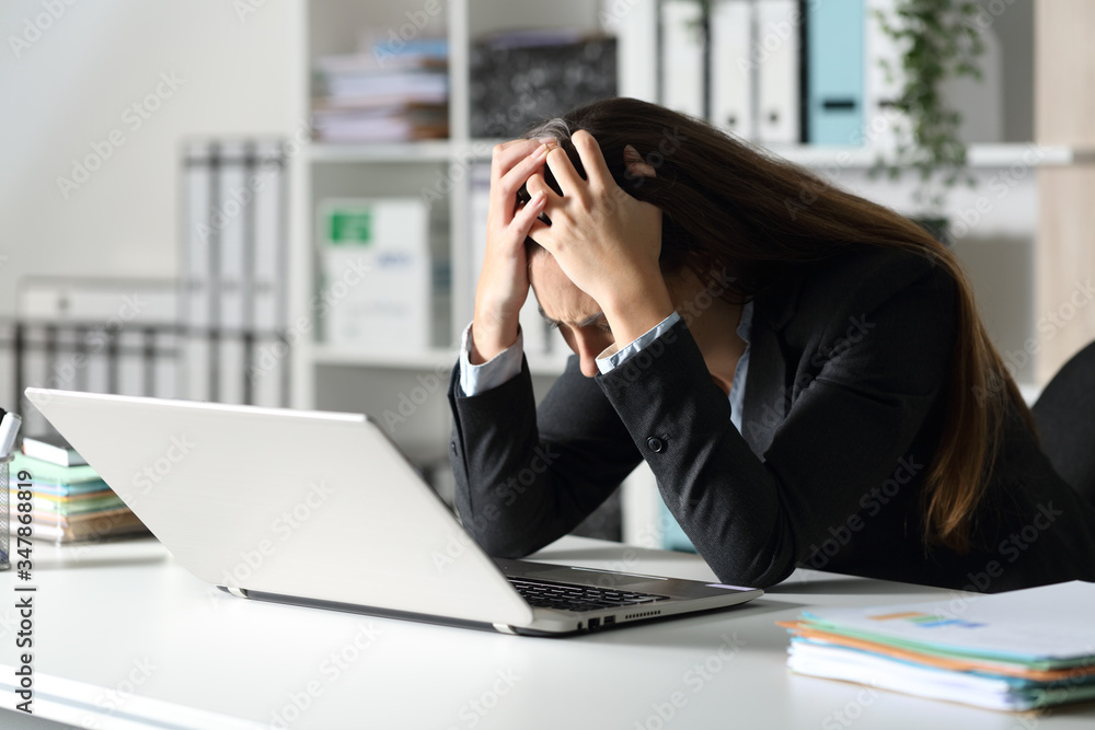 Sad executive complaining on her desk at the office Stock Photo | Adobe ...