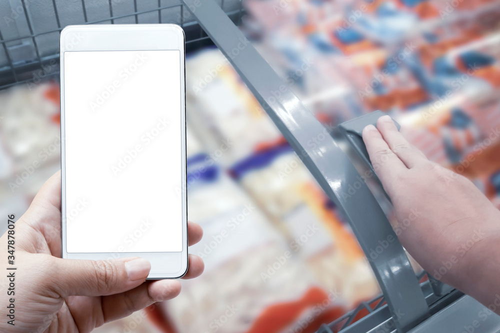 Online order grocery shopping on touch screen concept. Woman hand ...