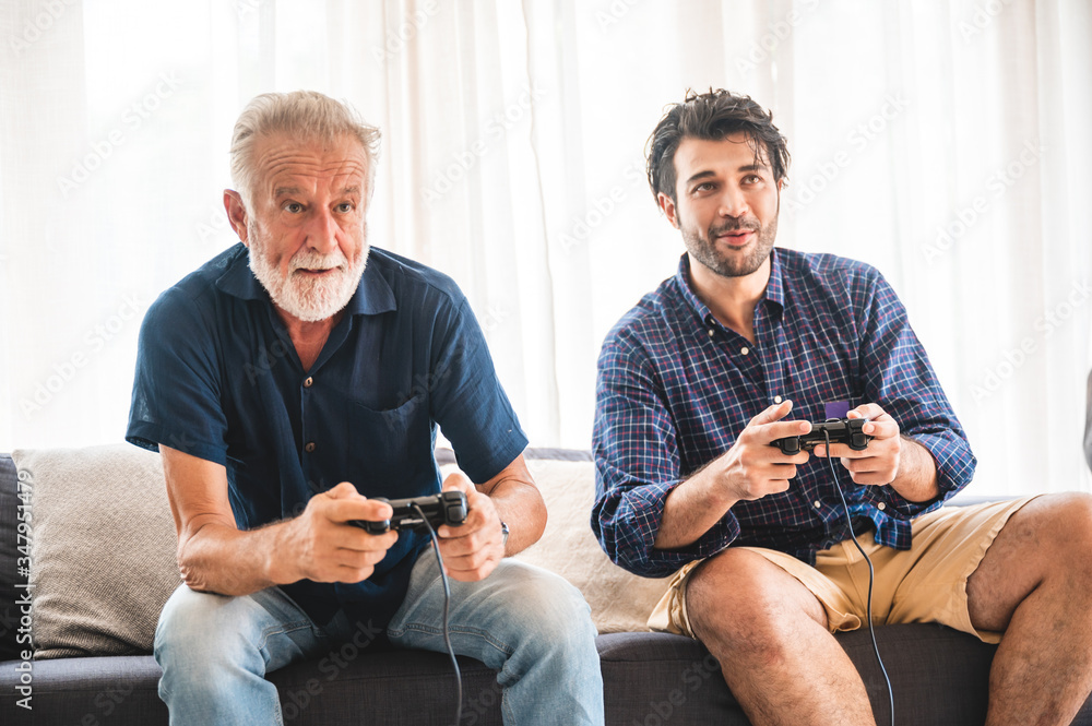 Happy two age generations men family old father embracing young grown ...