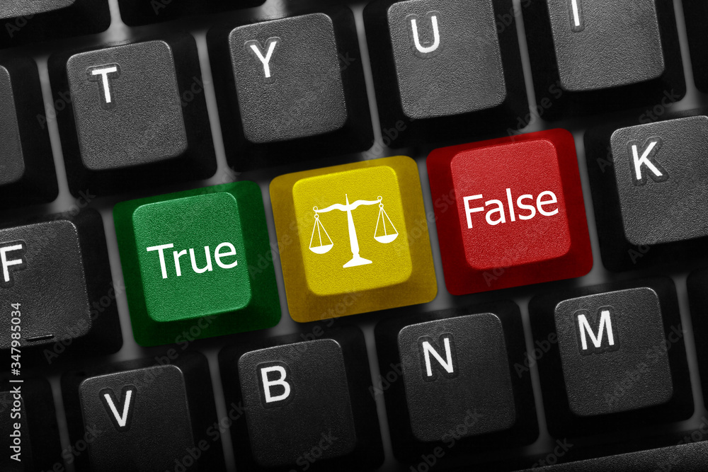 Three keys conceptual keyboard - True and False keys with scales symbol ...