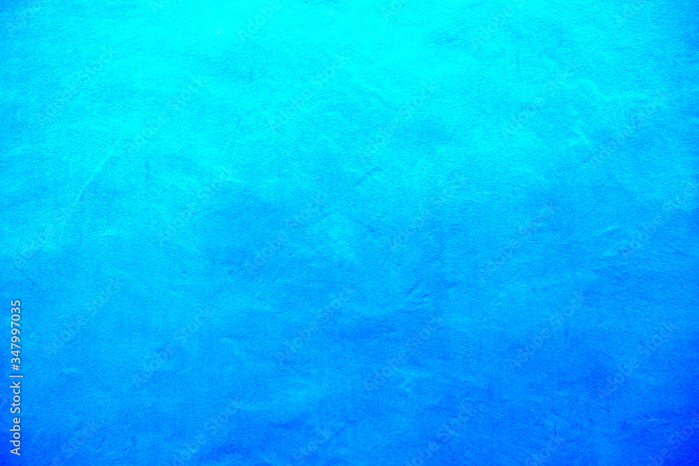 Perfect neon blue, luminous azure background with darker blue overtones ...