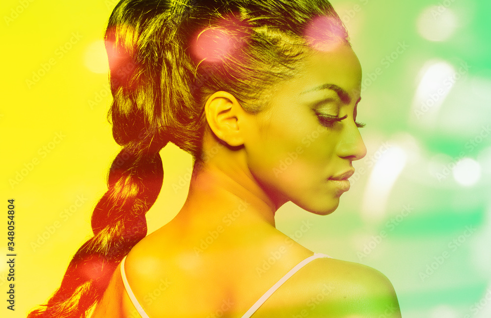 Beautiful woman with long braided hair, profile shot. Stock Photo ...