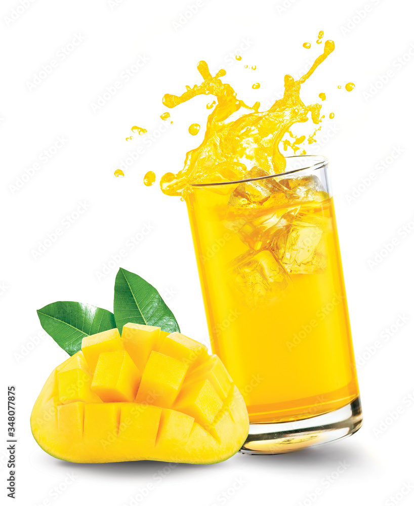 Glass of splashing mango juice with mango fruit on white background ...