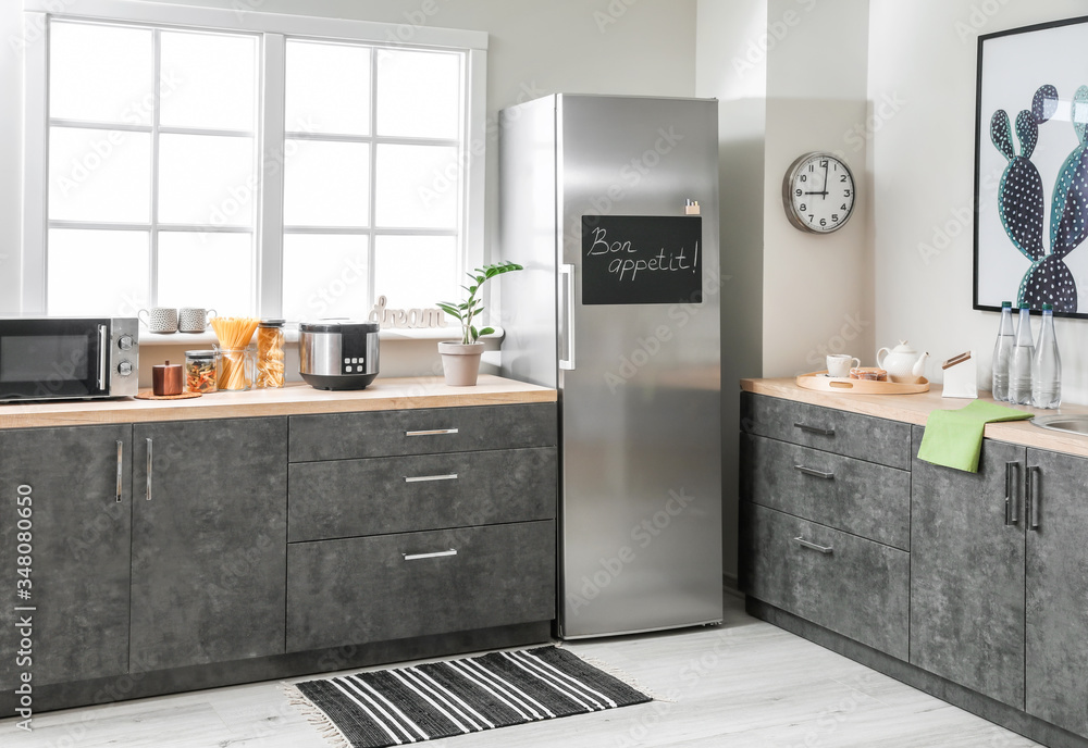 Stylish interior of modern kitchen with big refrigerator Stock Photo ...