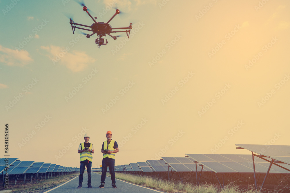 Engineer inspect and checking solar panel by Drone at solar power plant ...