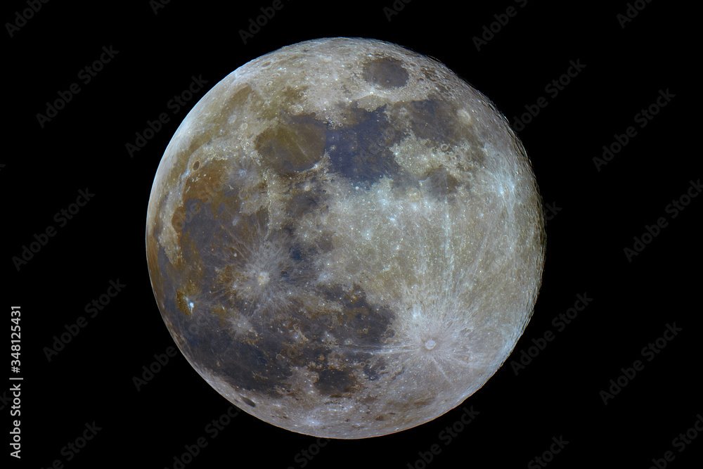 Full mineral Moon phase, isolated in the black space, with its natural ...