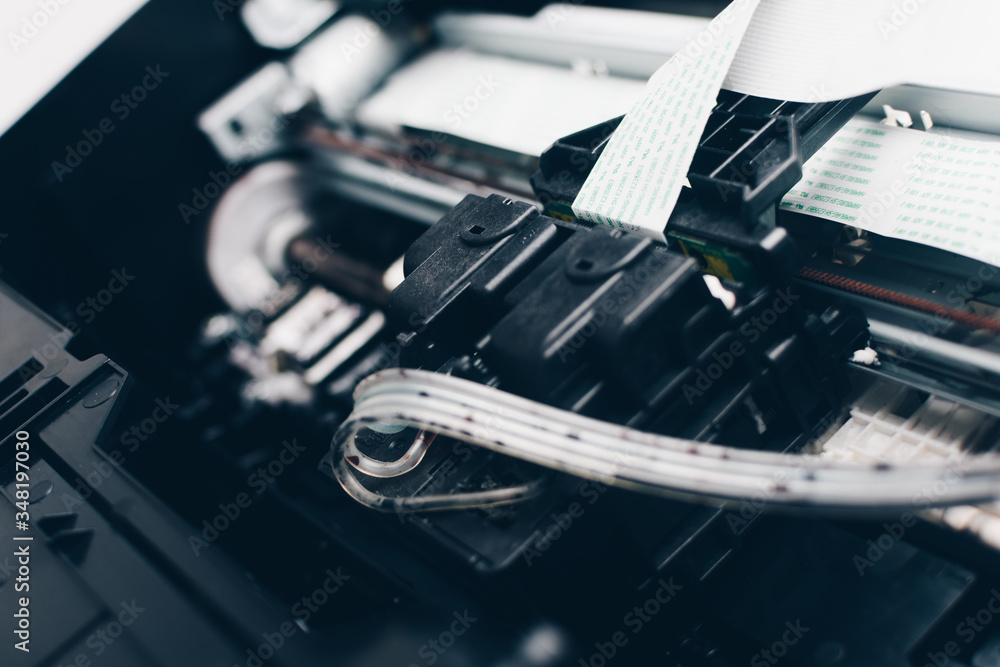 Poster Close-up Interior of printer showing continuous ink system in ...