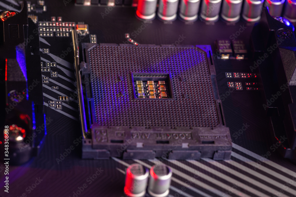 Socket am4. Close up of the AM4 socket for the motherboard with neon ...