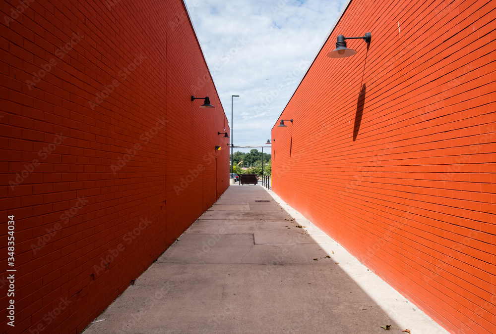 Street photography of abstract long alleyway. Pathway between two ...