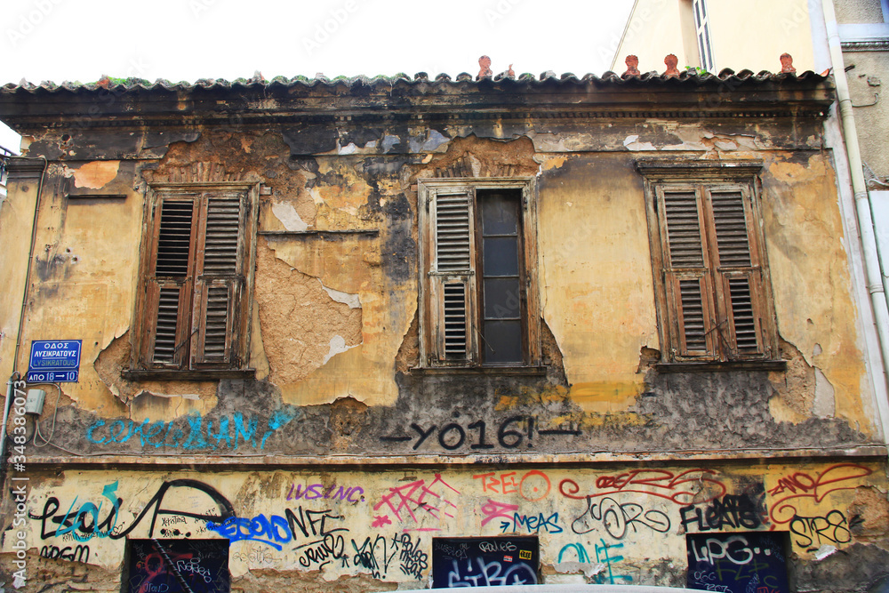 Exterior of an old, rundown, abandoned and neglected building with ...