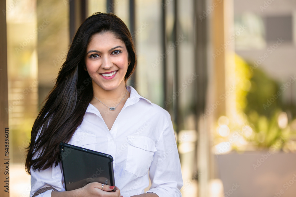 Portrait of a beautiful smiling cheerful female indian american ...