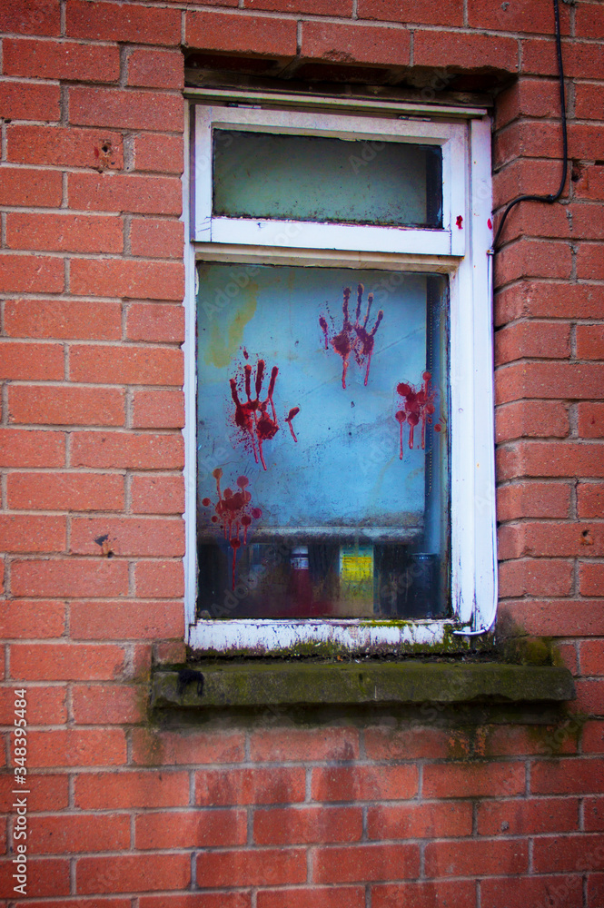 Bloody Handprints On Window Of Brick Building Stock Photo | Adobe Stock