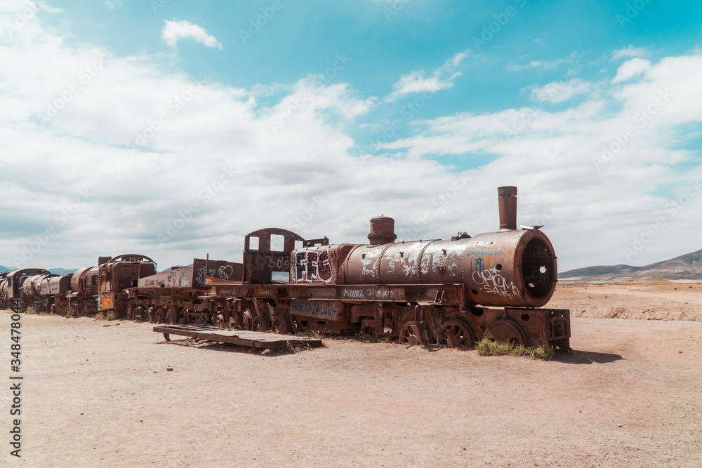 Train Cemetry Bolivia Salt Flats. Bolivian salty desert and blue sky ...