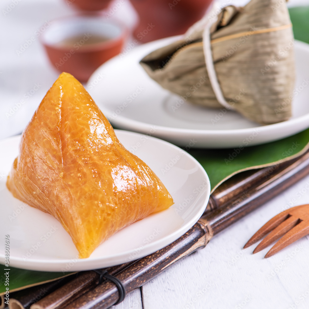 Zongzi - alkaline Chinese rice dumpling crystal food on a plate to eat ...