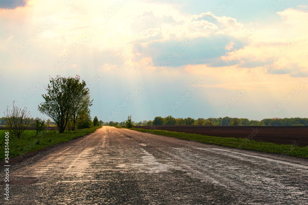 Picturesque landscape photo of empty old rural asphalt road through ...