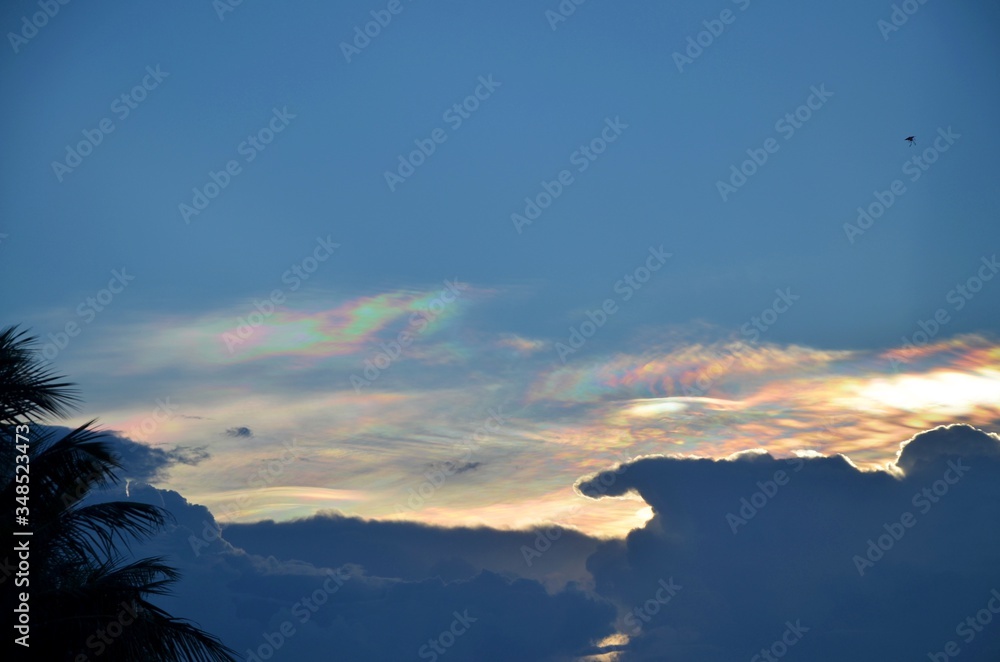 Rainbow-colored light effects around clouds in Monsoon season in South ...
