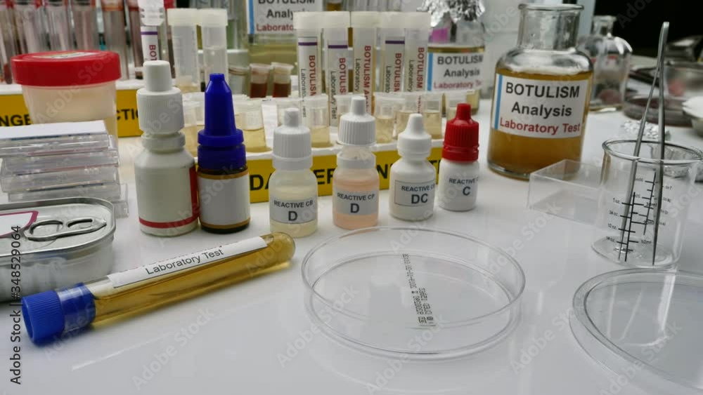 Experienced laboratory scientist analyzing a fecal sample, botulism ...