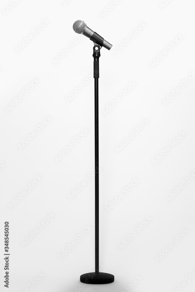 Stand with modern microphone on white background Stock Photo | Adobe Stock