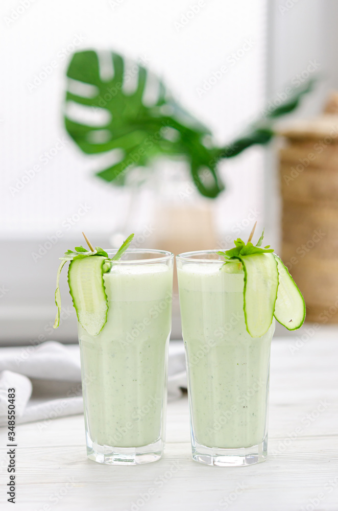 Refreshing fermented milk drink with cucumber and herbs. Two with such ...