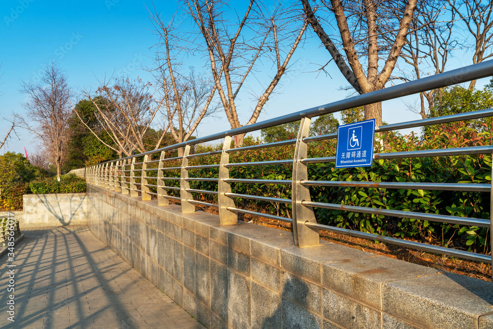 A wheelchair ramp, an inclined plane installed in addition to or ...