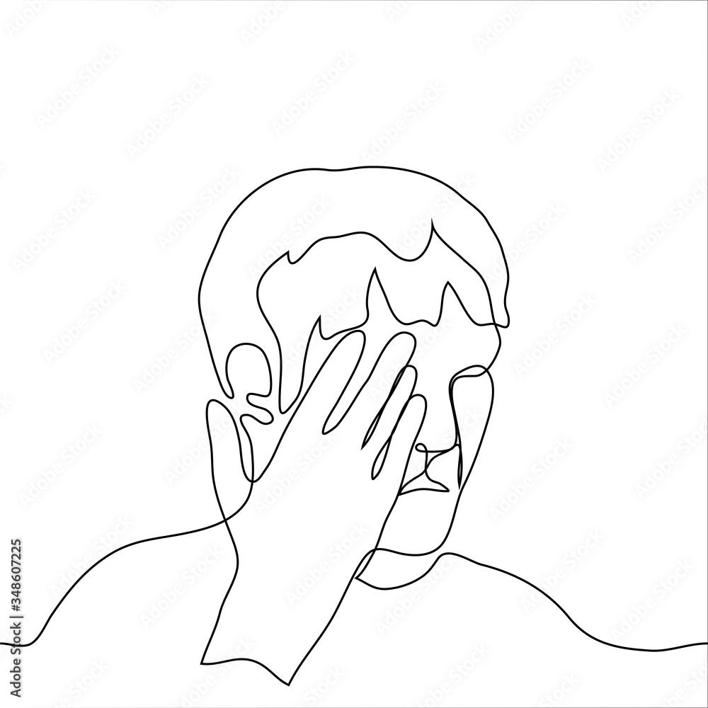 The face of a man with short hair (man) who cries and wipes tears with ...