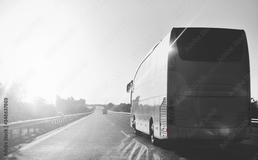 shuttle bus speeding by highway in black and white style Stock Photo ...