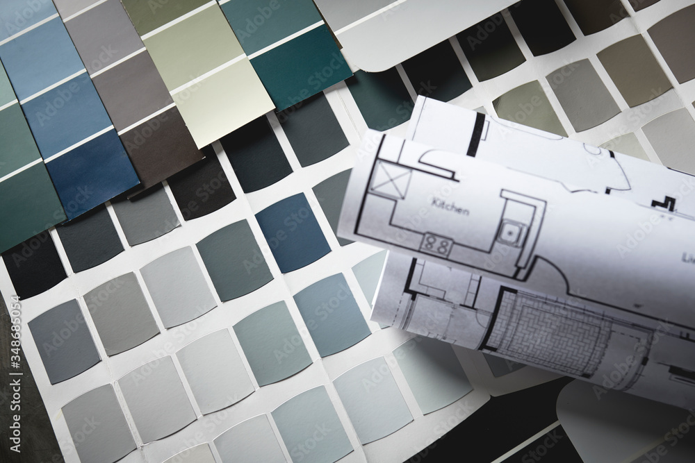 paint samples with kitchen blueprint for remodeling, focus is on paint ...