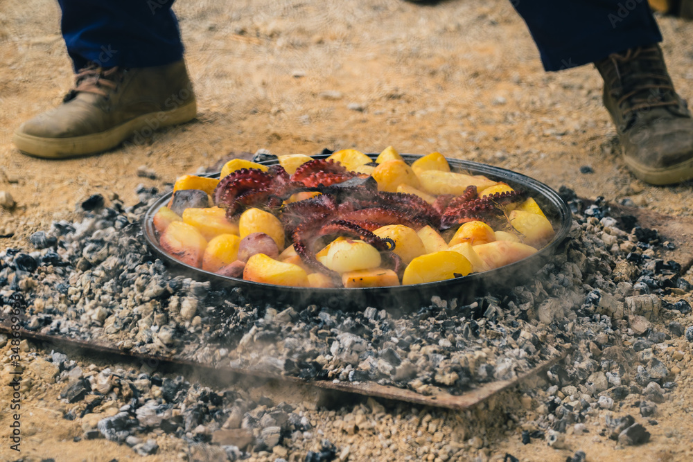 Cooking traditional balkan turkish bosnian dalmatian meal Peka in metal ...