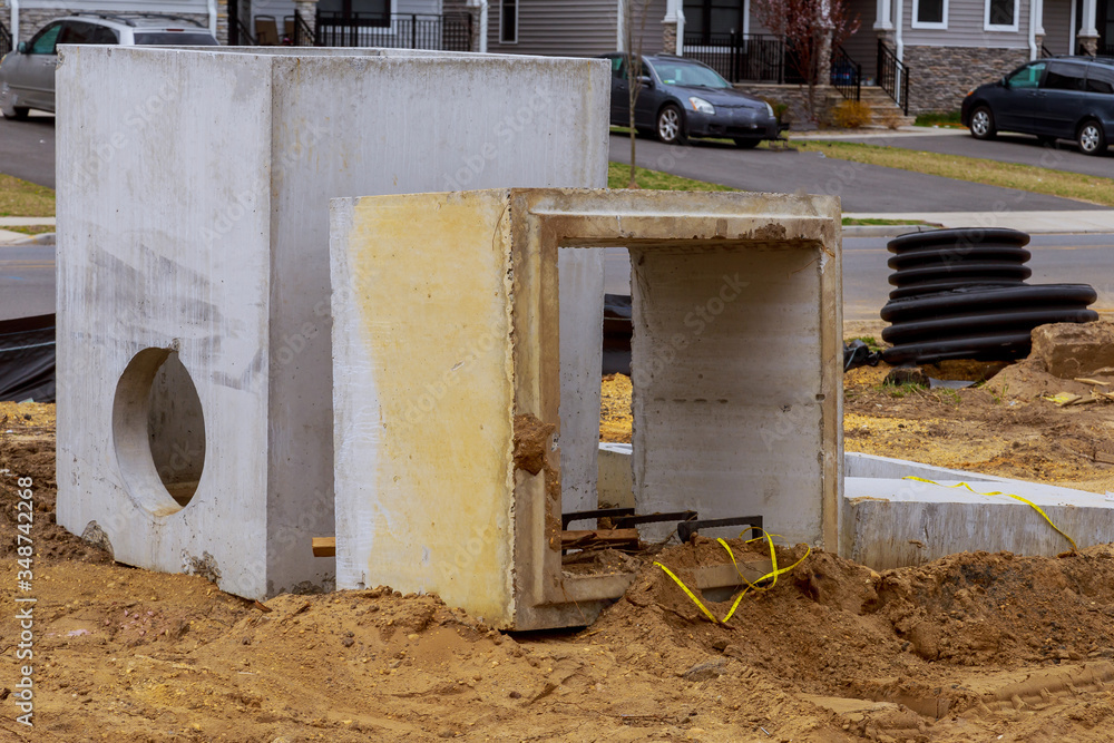 The square concrete blocks with hole in the center, installed in ...